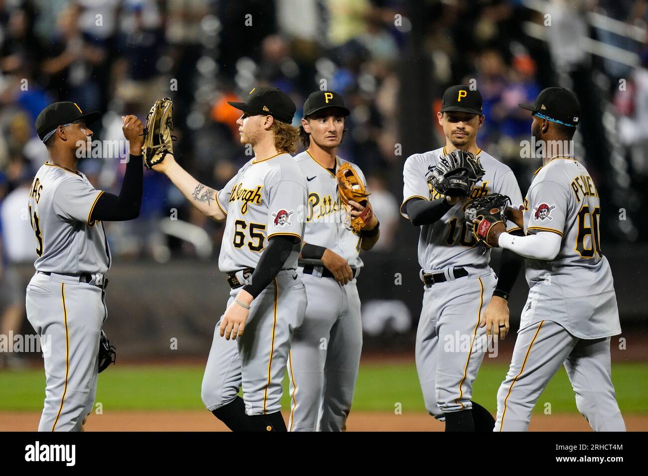 Pittsburgh Pirates' Jack Suwinski (65), Bryan Reynolds (10) and Liover ...