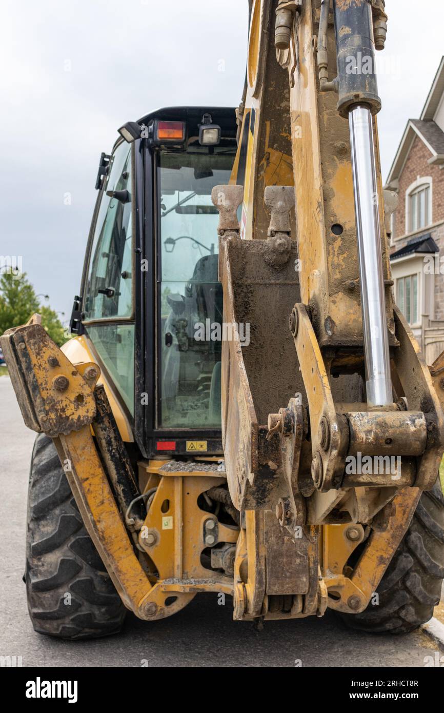 Backhoe city street hi-res stock photography and images - Alamy