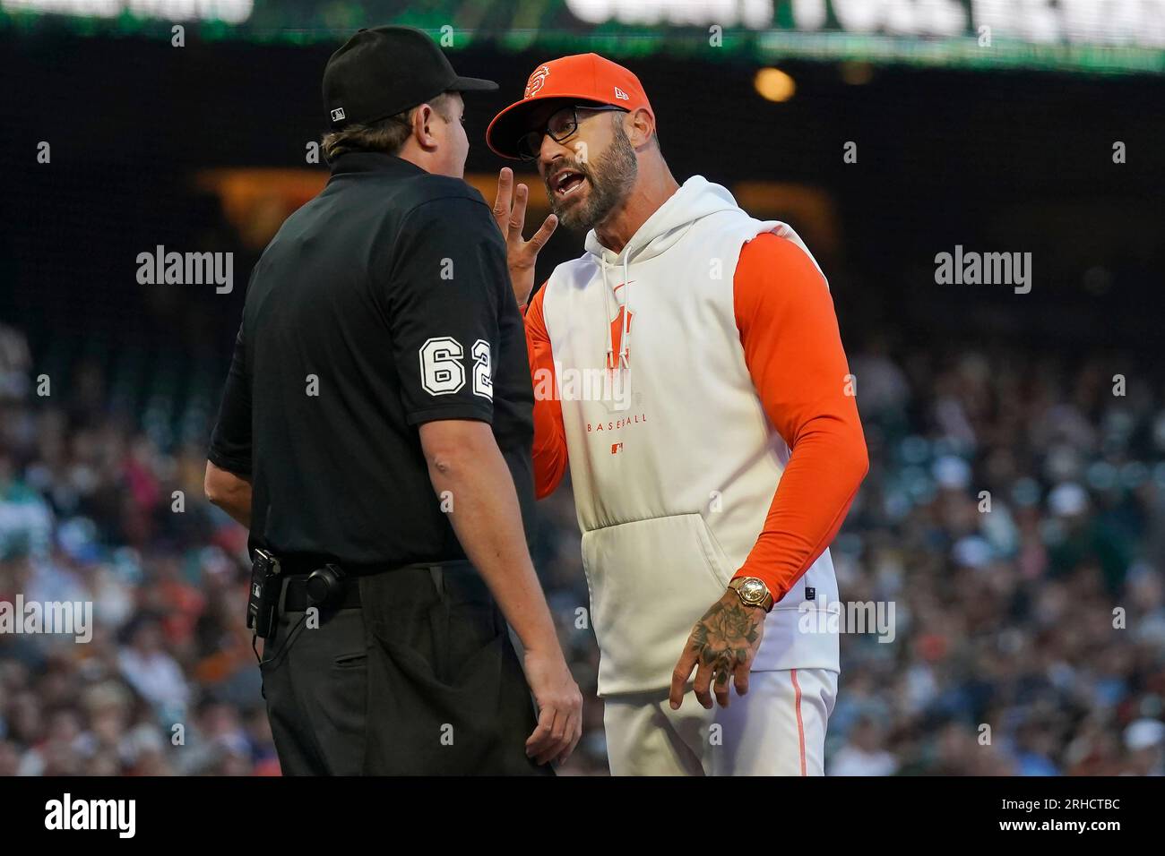 San Francisco Giants manager Gabe Kapler, right, gestures toward home ...
