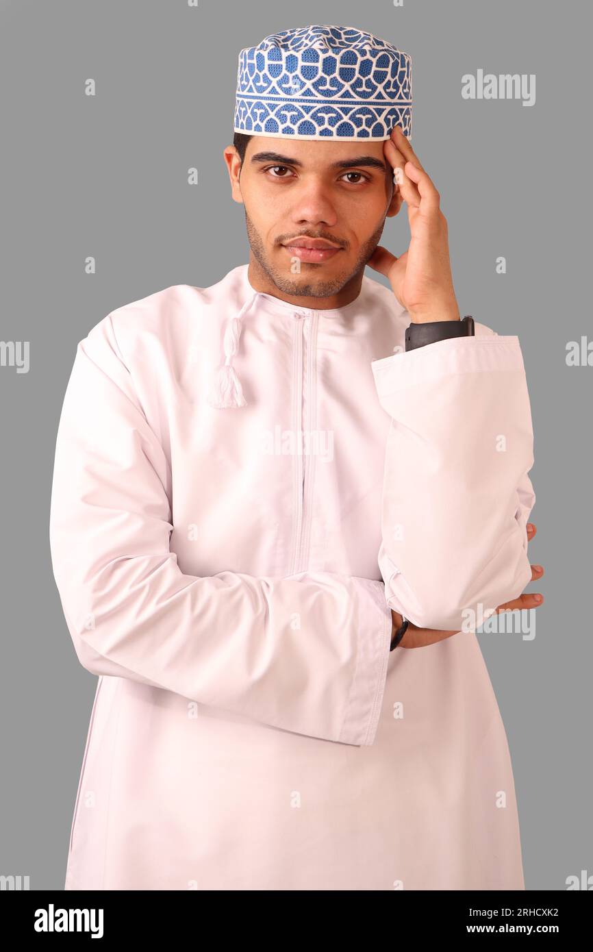 Omani Man making hand gesture Stock Photo - Alamy