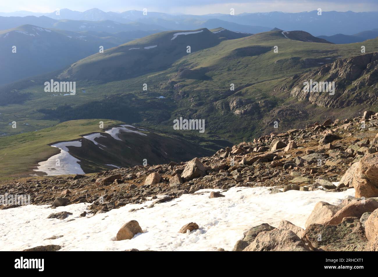 Snow patches on mountain tops Stock Photo - Alamy