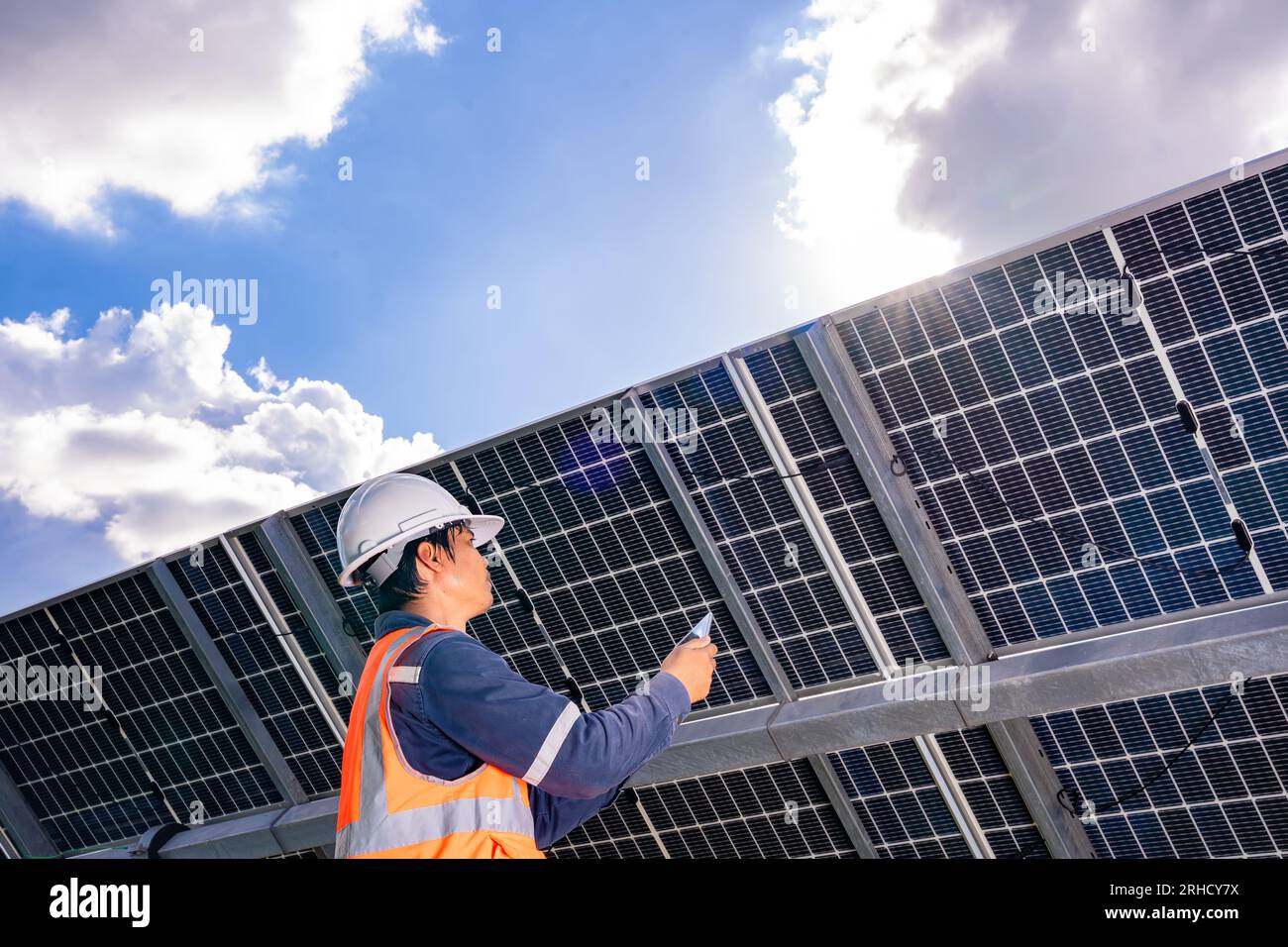 Technicians are checking the operation of the solar power plant ...