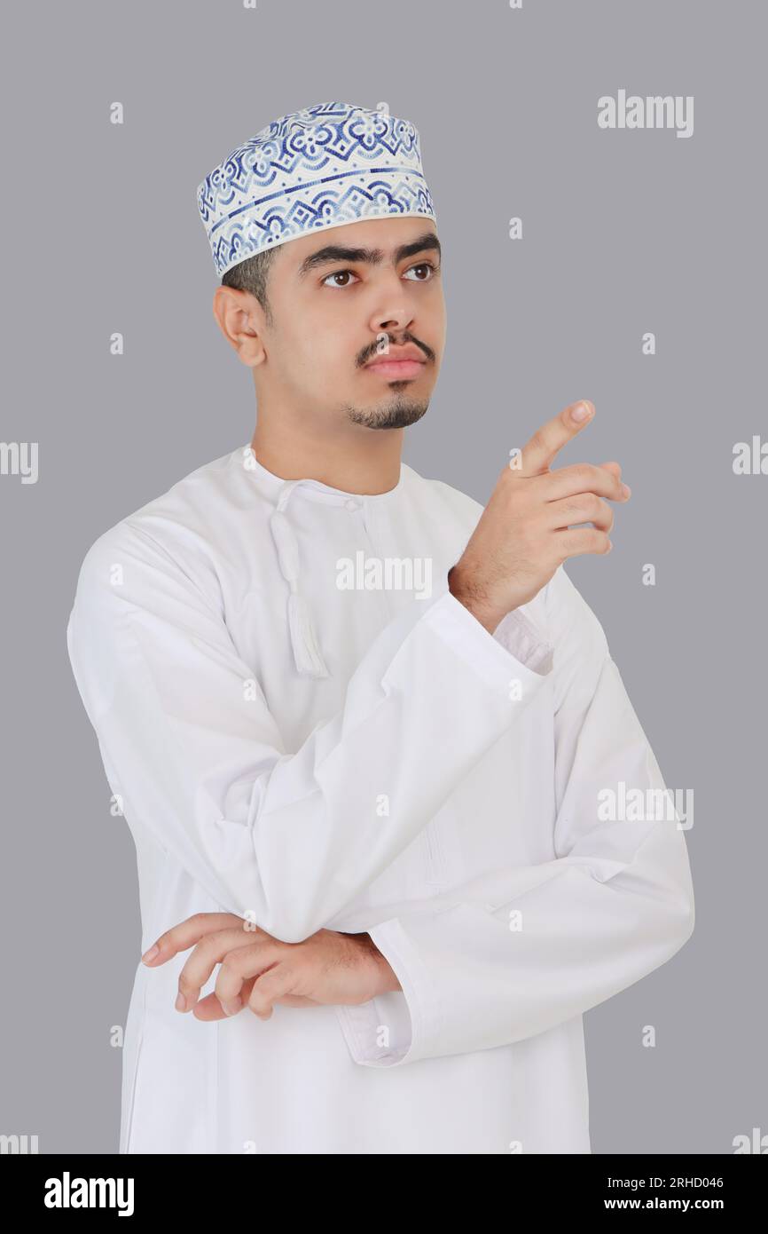 Omani Male making hand gesture Stock Photo - Alamy