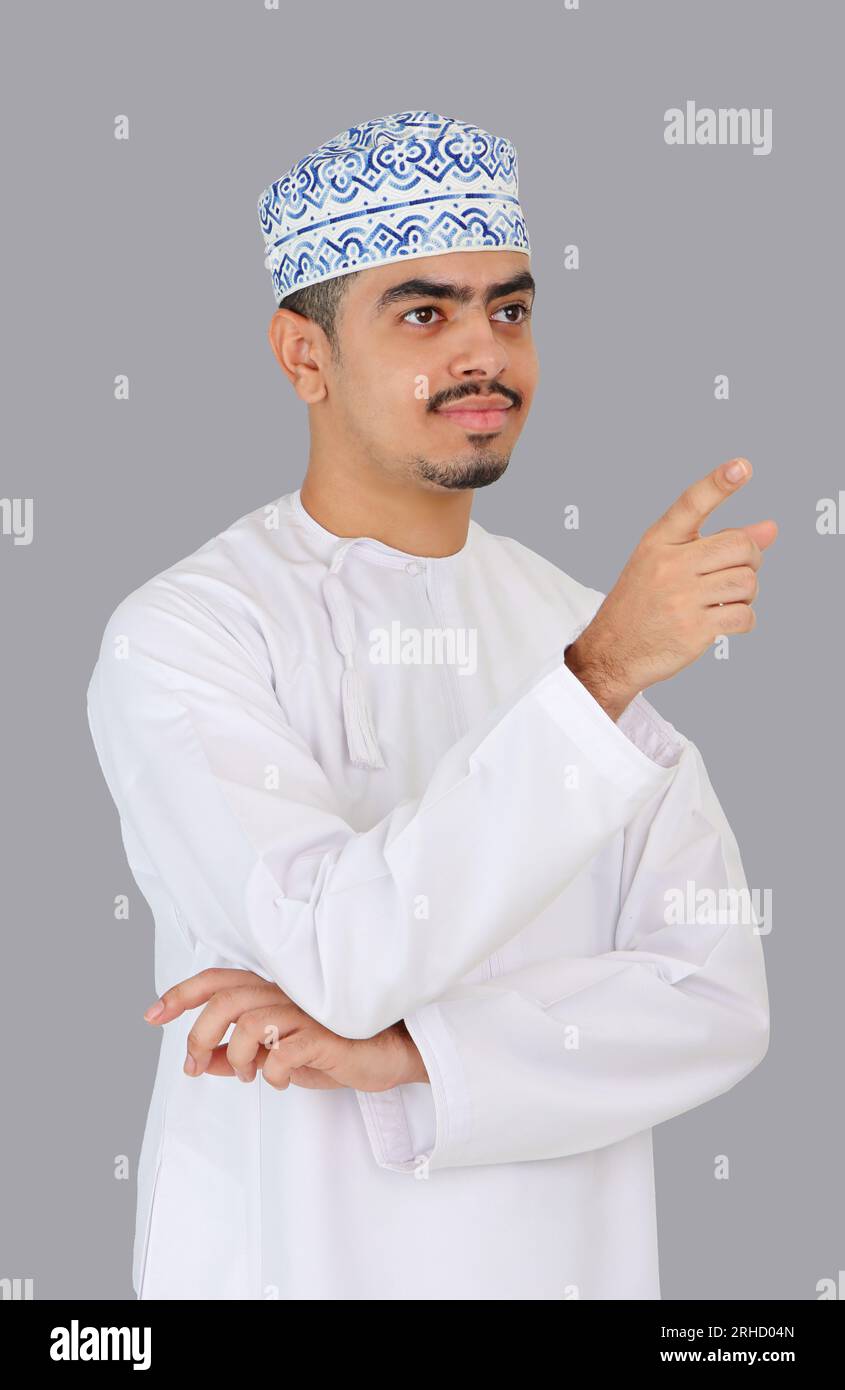 Omani Male making hand gesture Stock Photo - Alamy