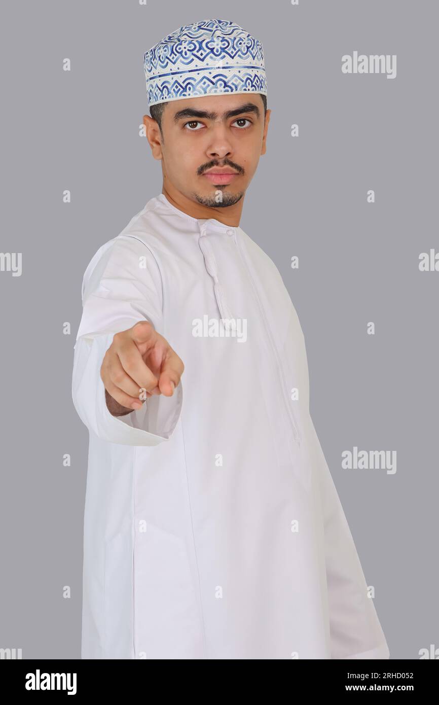 Omani Male making hand gesture Stock Photo - Alamy