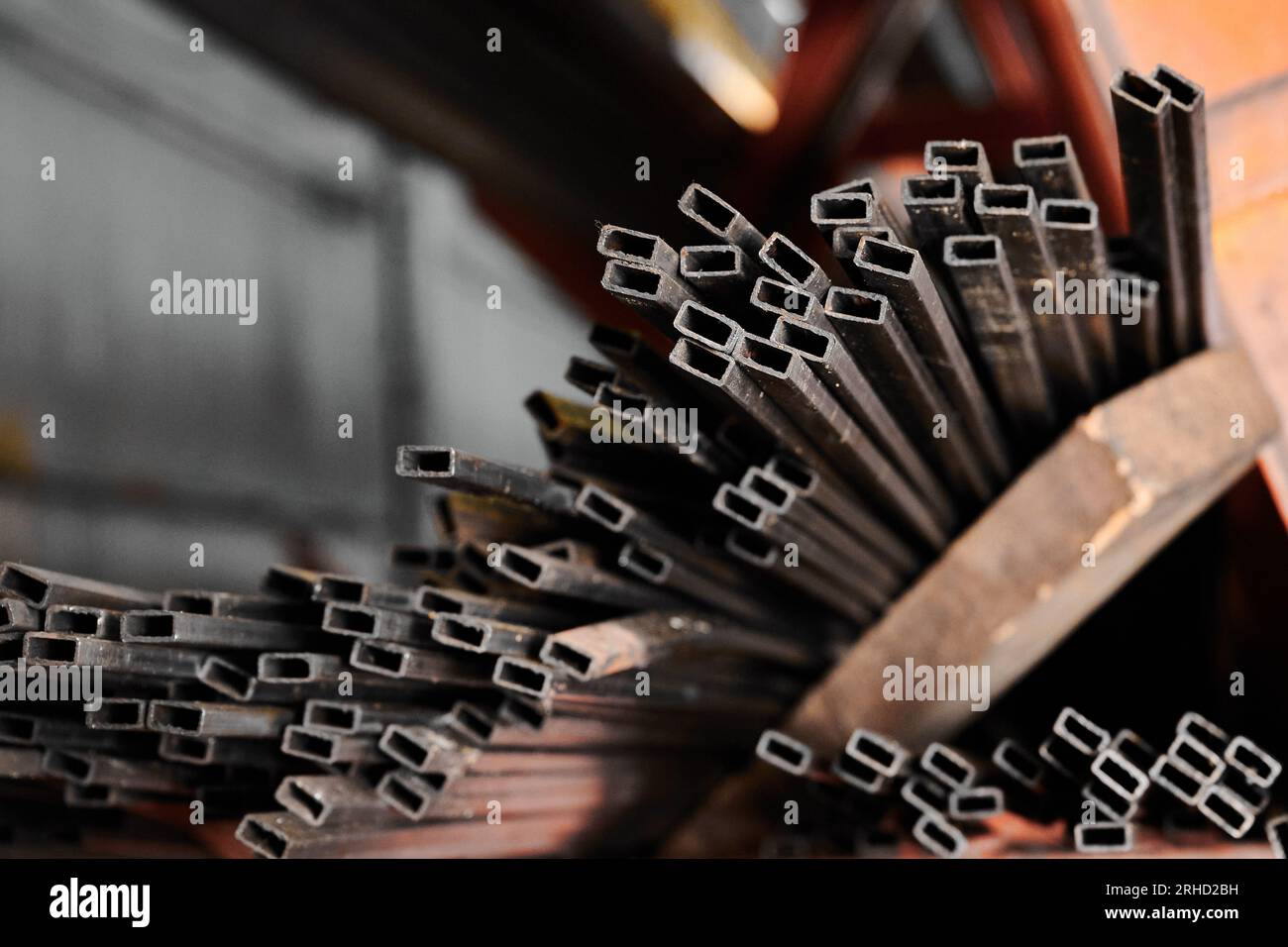 Rectangle heat tubing on rack in cold factory warehouse Stock Photo - Alamy