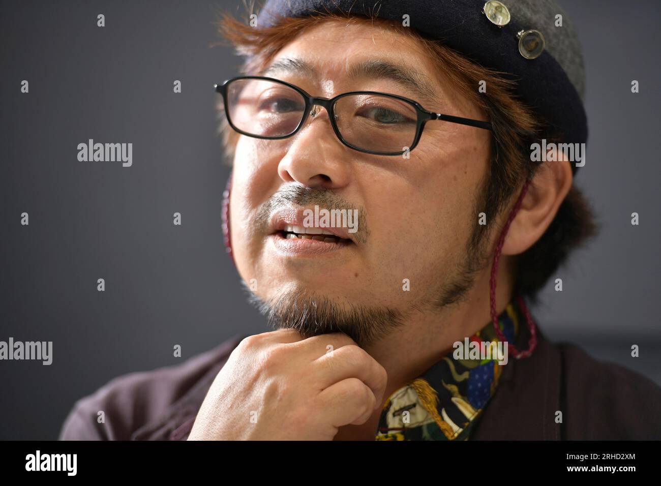 Japanese filmmaker Takashi Suzuki attends an interview in Tokyo on Aug ...