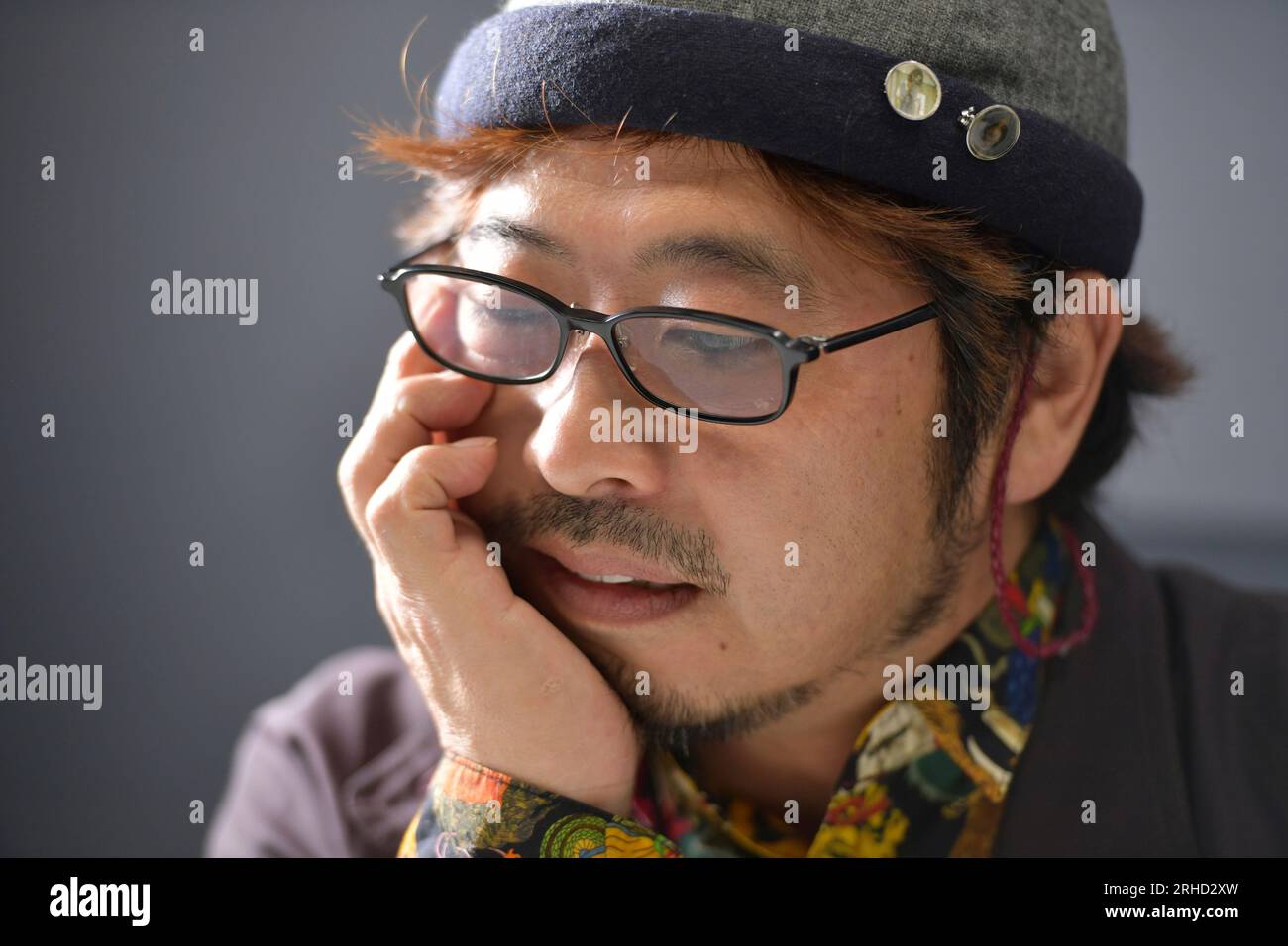 Japanese filmmaker Takashi Suzuki attends an interview in Tokyo on Aug ...