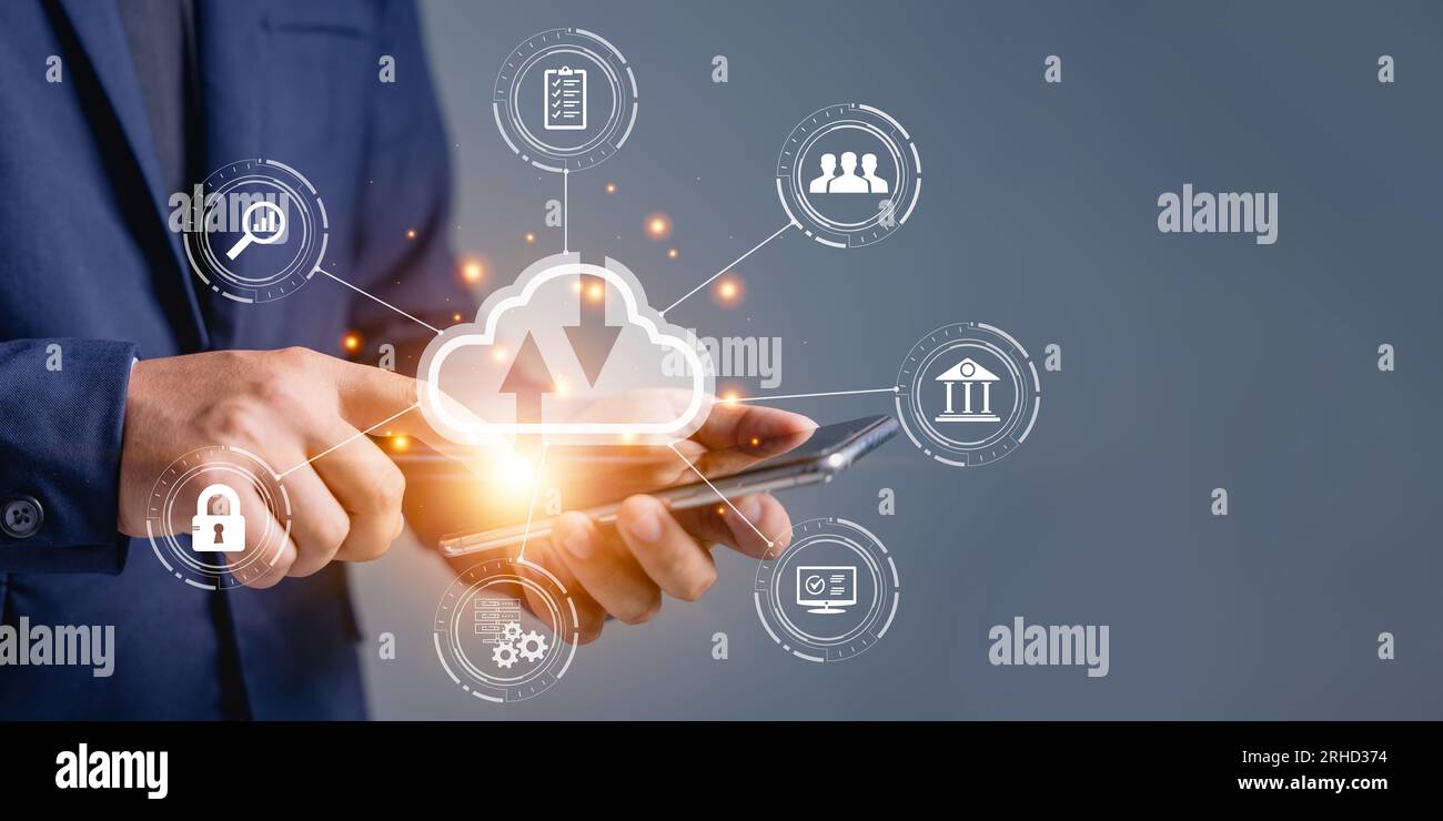 Businessman uses a smartphone with cloud computing diagram shown up a hand. Cloud technology ...