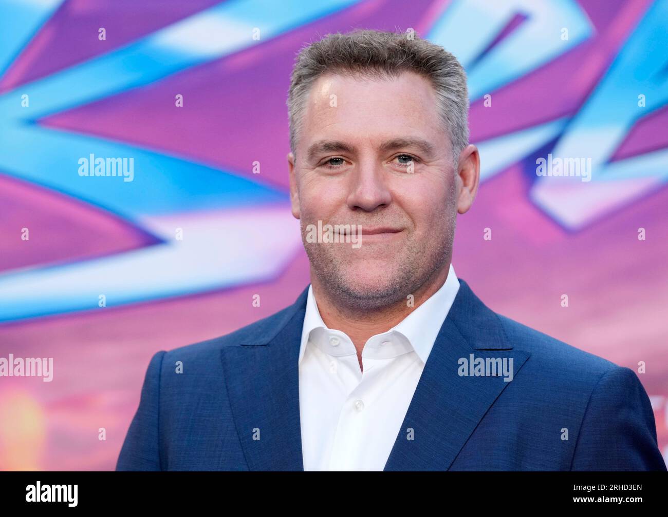 Producer John Rickard poses at a screening of the film "Blue Beetle ...