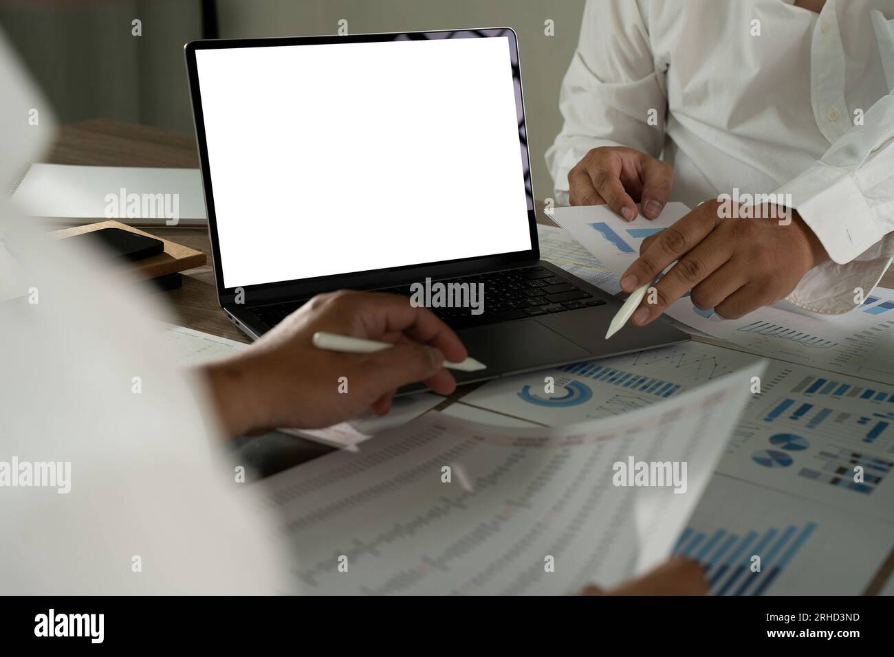 Laptop with blank screen on table. Workspace background new project on ...