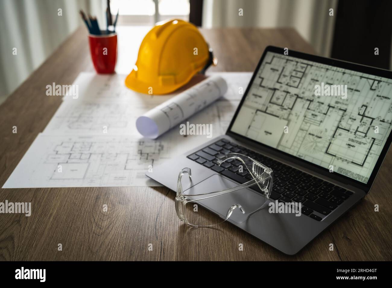 Architecture plans architect paper Clear protective glasses on a ...