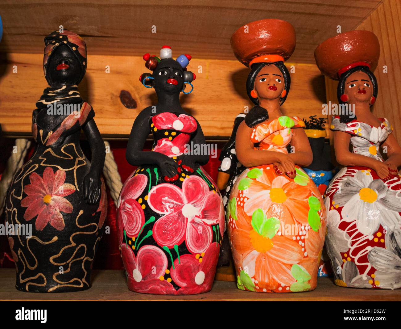 Clay and colorful dolls, typical of Northeast Brazil, are souvenirs for ...