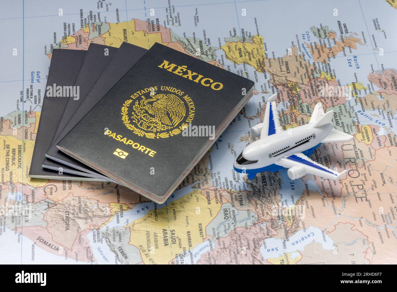 Mexico City, Mexico. Aug 3, 2023. Mexican passport next to an airplane ...