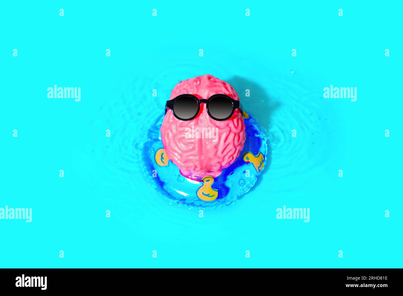 Charming character, made from a human brain model wearing sunglasses ...