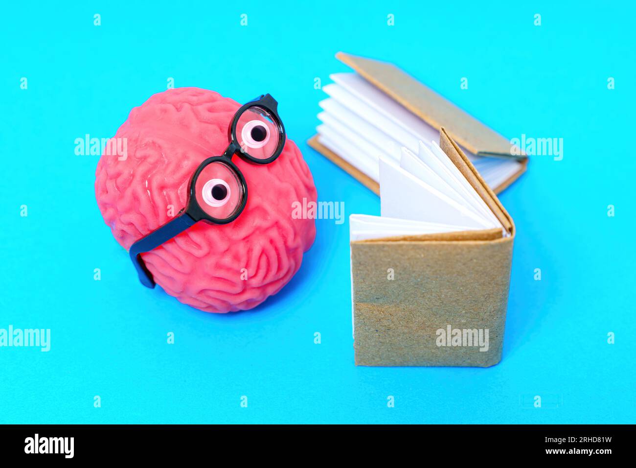 Cute human brain character, adorned with googly eyes and nerdy glasses ...