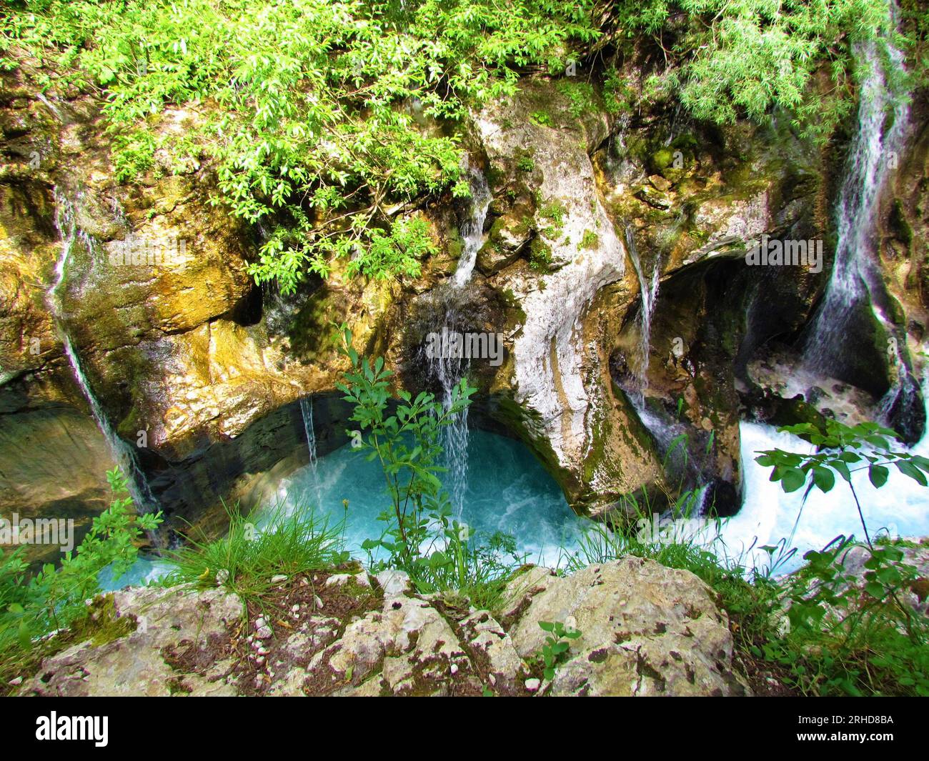 Waterfalls falling into Soca river at the Great Soca gorge in Trenta ...