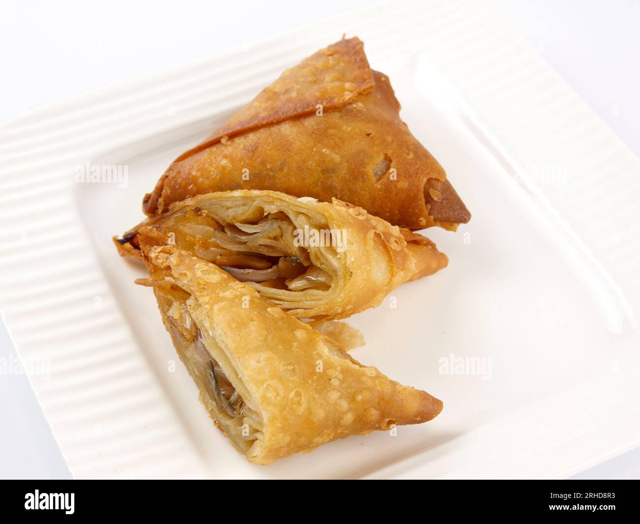 Samosa triangle shape fried hi-res stock photography and images - Alamy