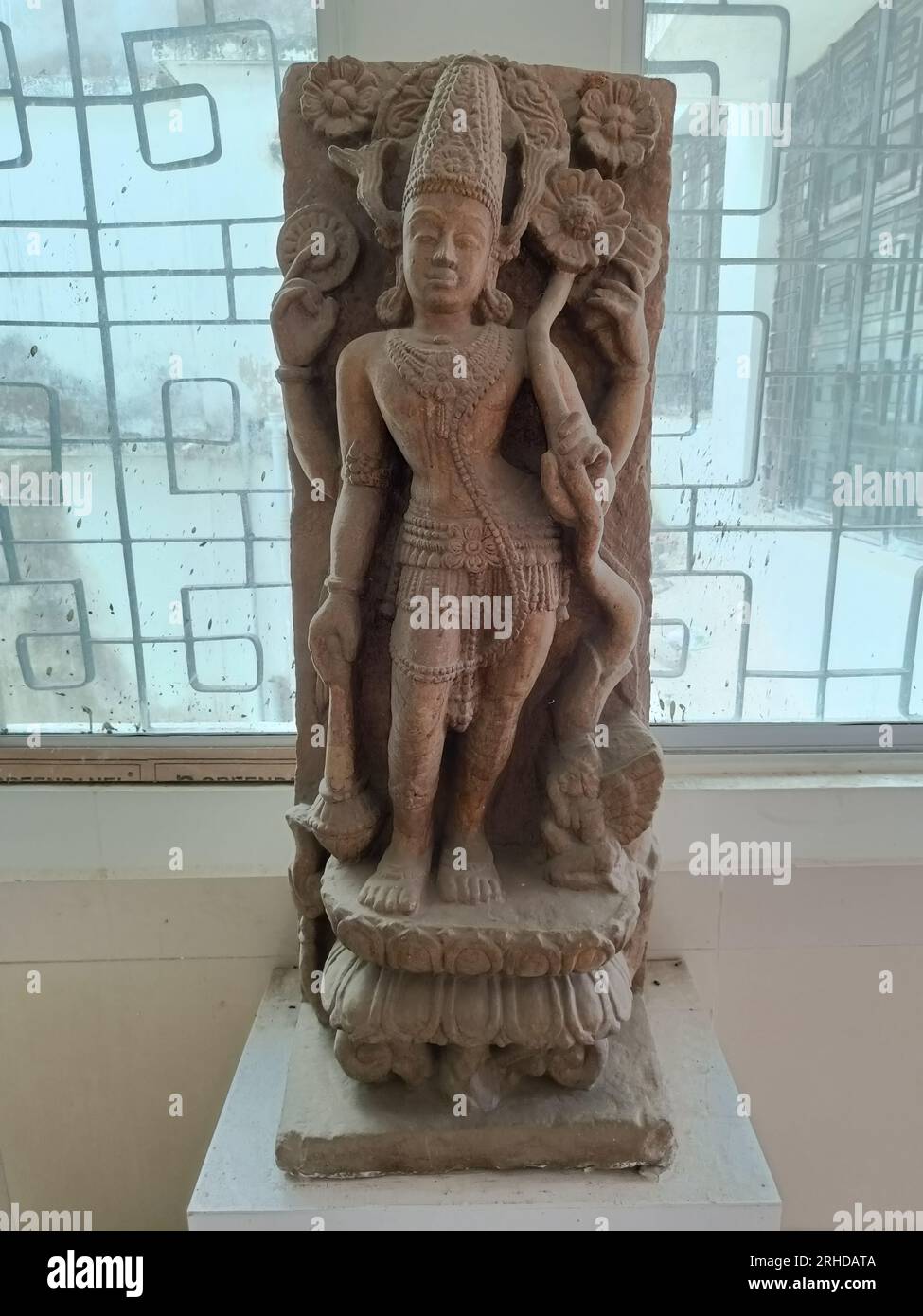 A statue of Vishnu. Holding Shankha (conch), Chakra (disc), Gada (mace ...