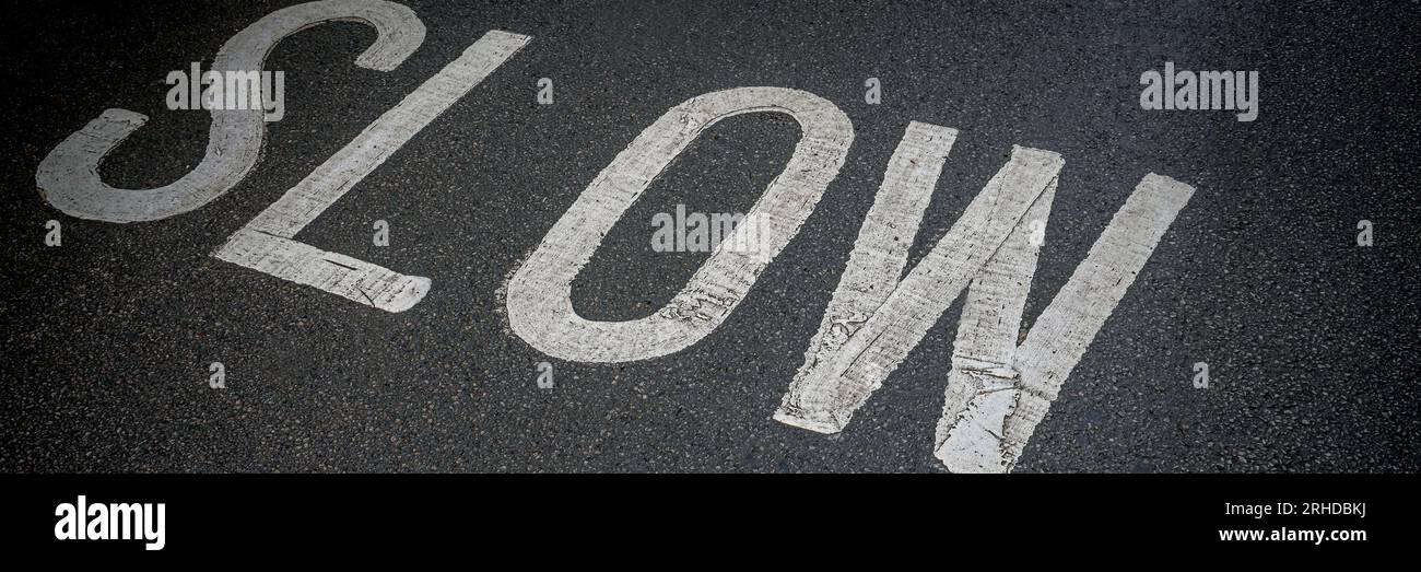 Slow down on the road Stock Photo - Alamy
