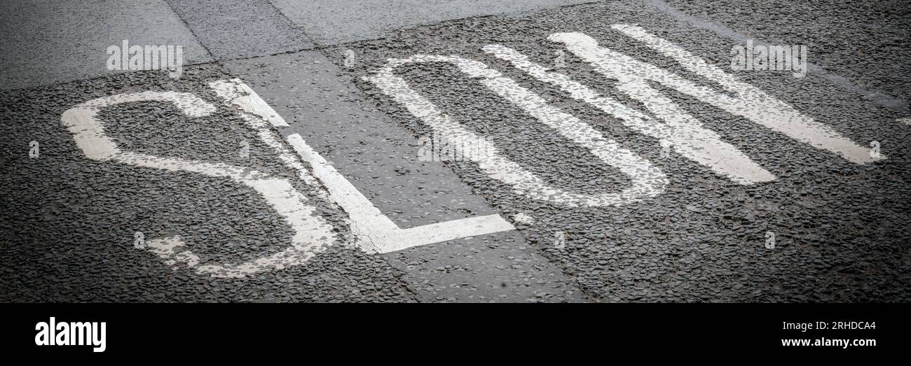 Slow down on the road Stock Photo - Alamy