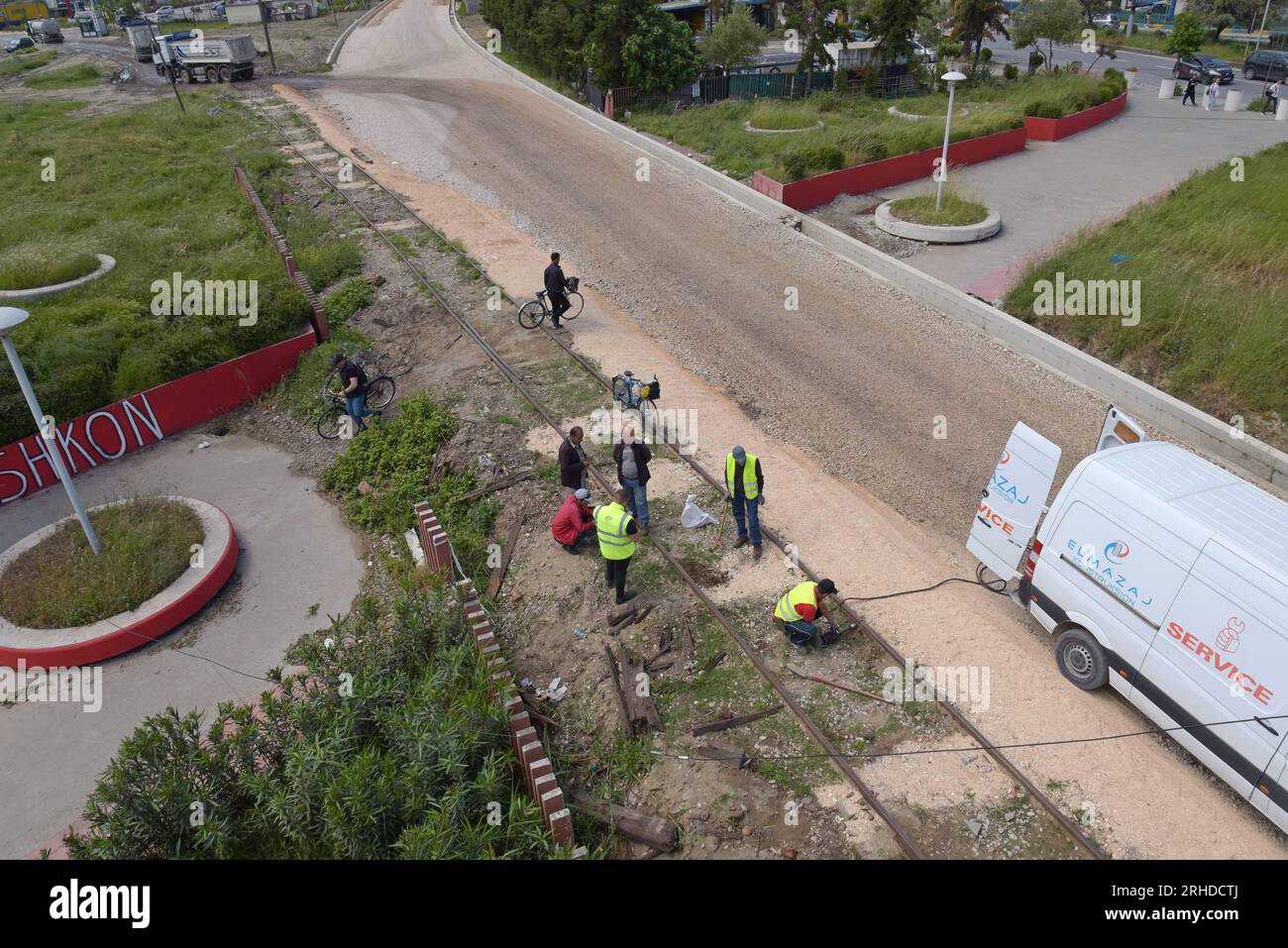 Construction workers using an oxy acetylene cutting torch to remove old ...