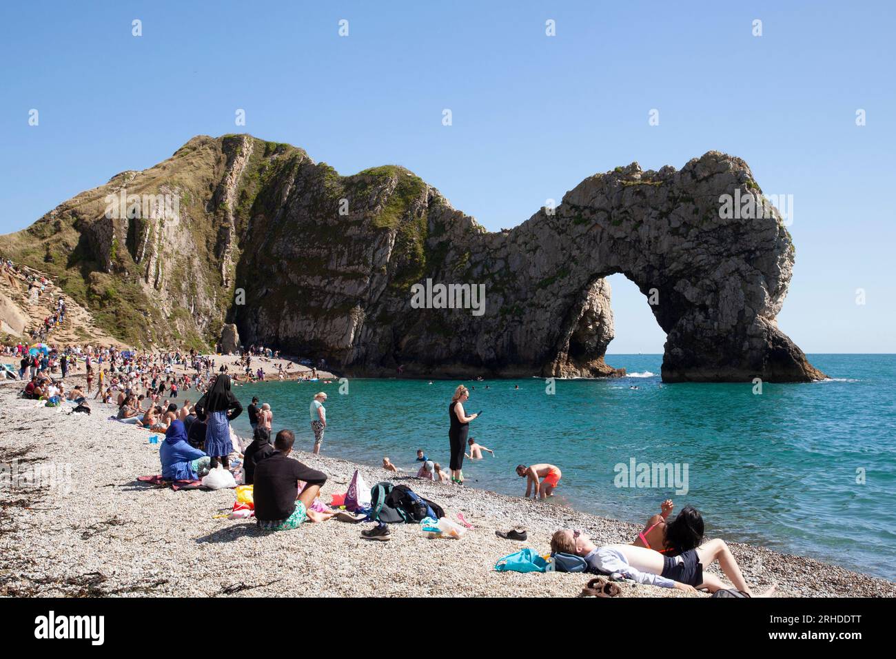 Durdle Door (sometimes written Durdle Dor ) is a natural limestone arch ...