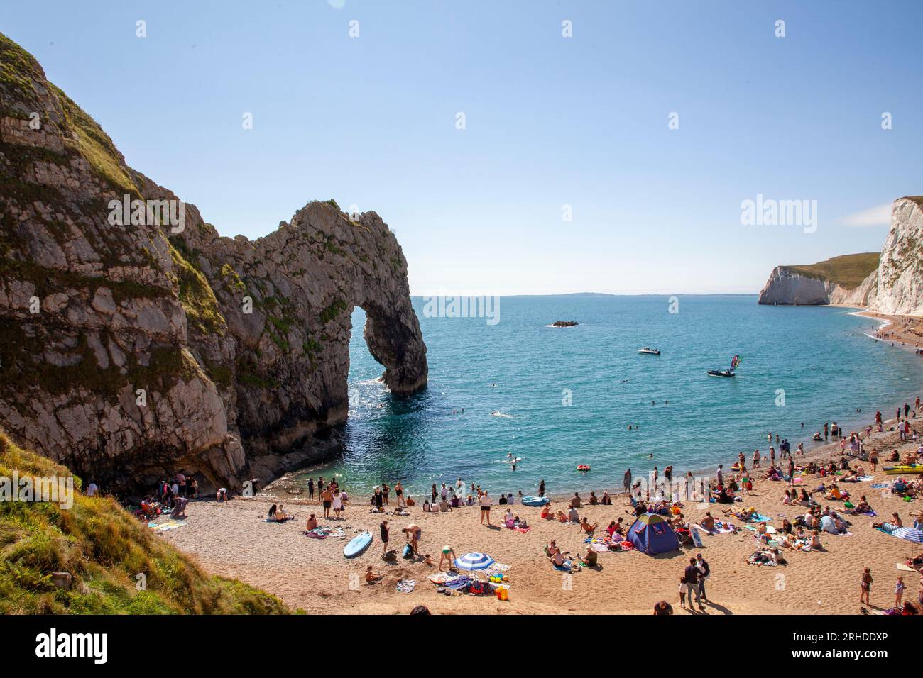 Durdle Door (sometimes written Durdle Dor ) is a natural limestone arch ...