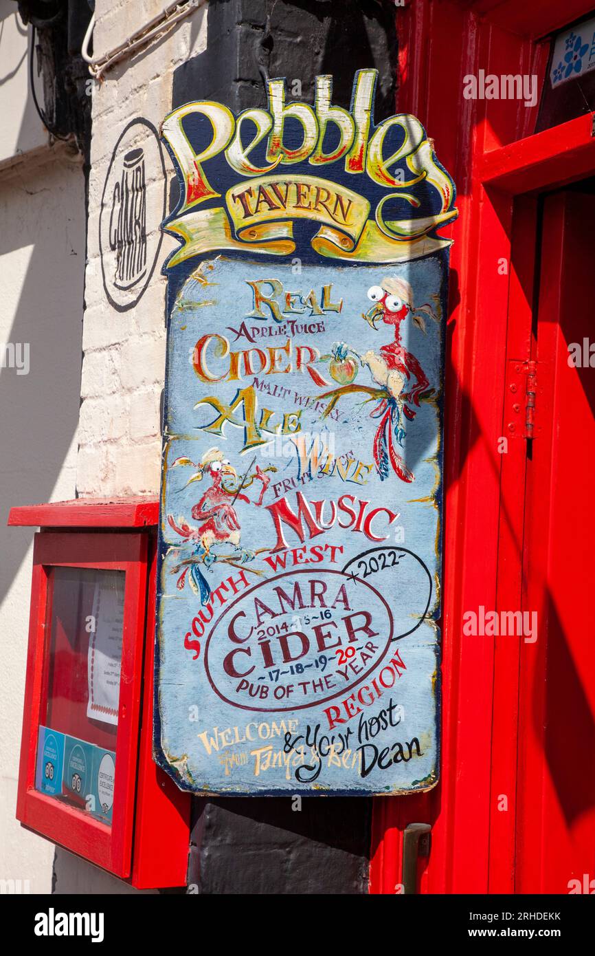 A sign for Pebbles Tavern in Watchet Stock Photo - Alamy