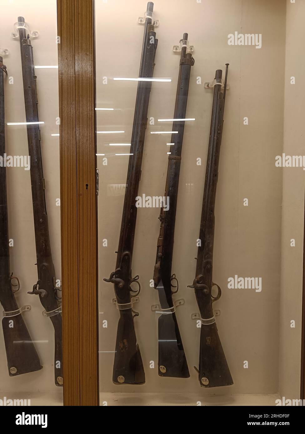 A few rifles that show a variety of guns such as flintlock; musket ...