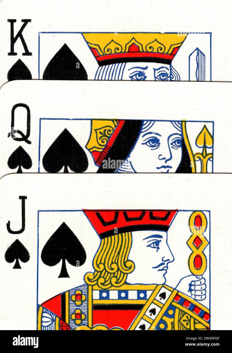 Vintage playing cards showing the jack, queen and king of spades Stock Photo - Alamy