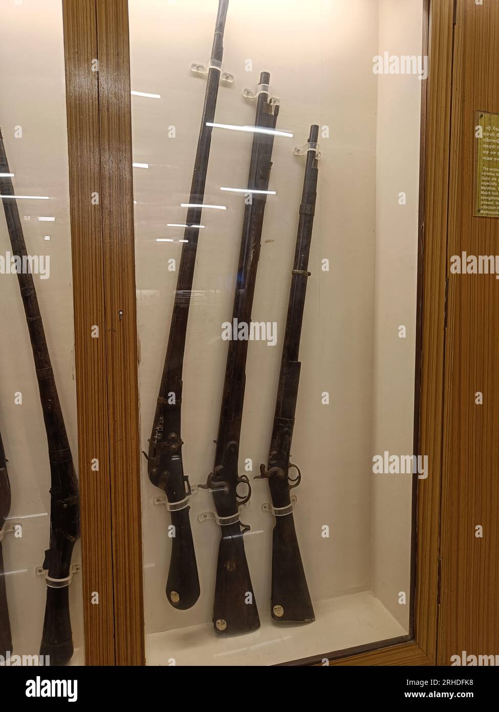 A few rifles that show a variety of guns such as flintlock; musket ...