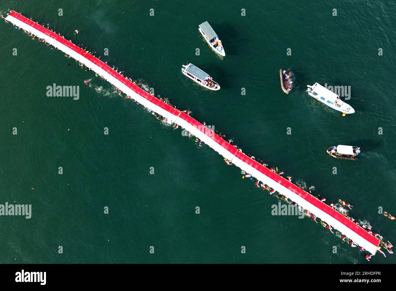 Jakarta, Indonesia. 12th Aug, 2023. This aerial photo shows swimmers ...