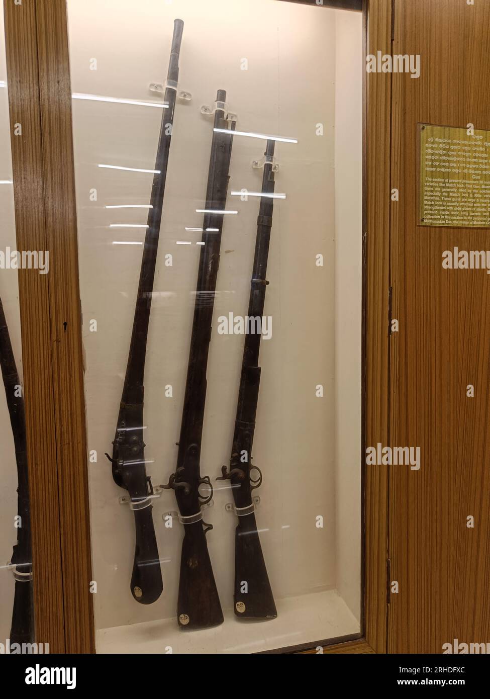 A few rifles that show a variety of guns such as flintlock; musket ...