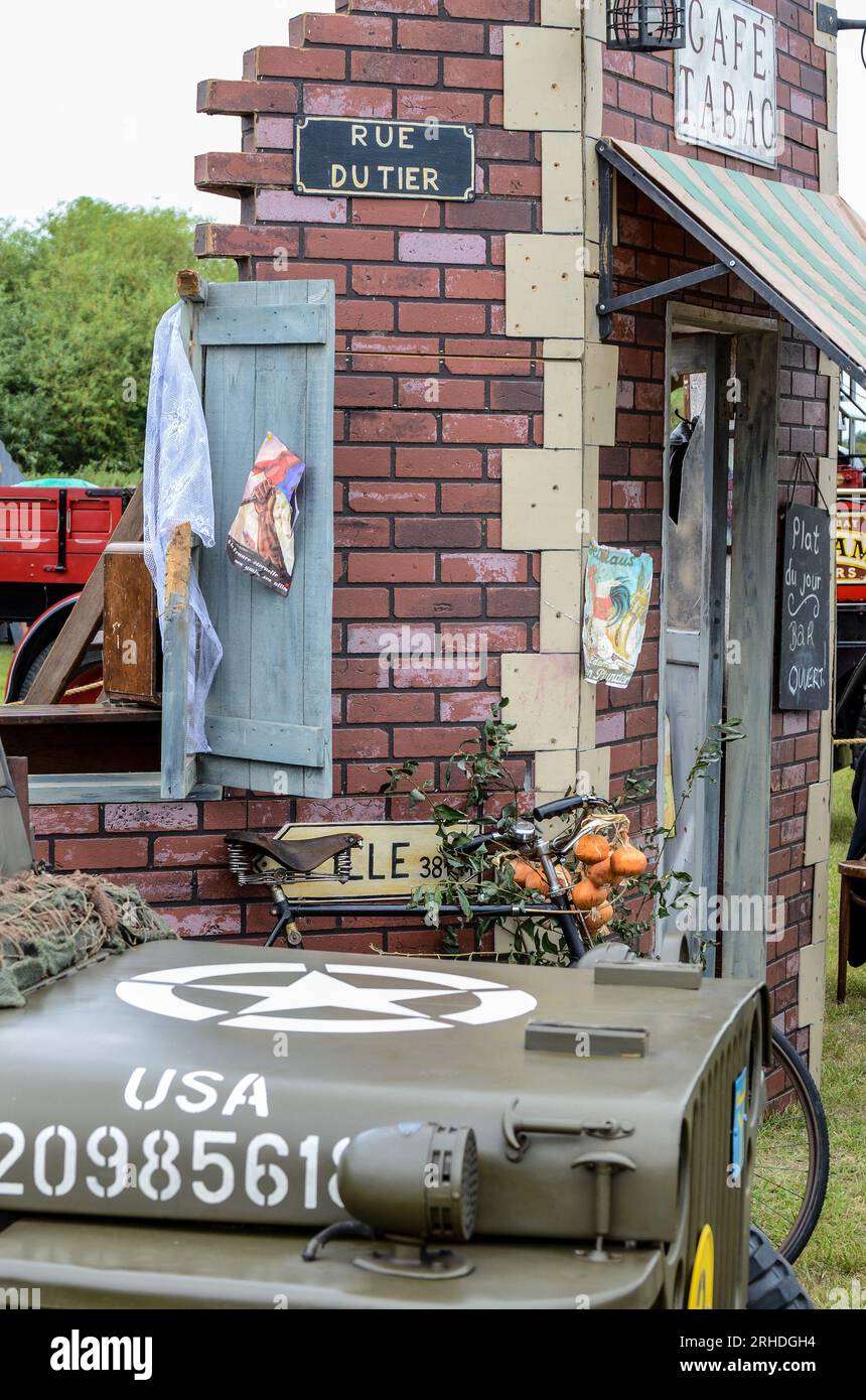 War damaged French cafe re-creation with US Army Jeep at a re-enactment ...