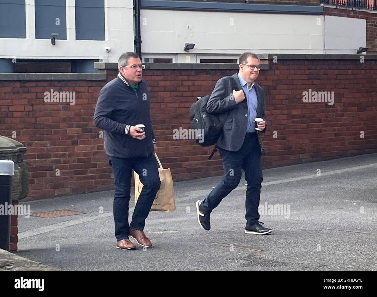 Gianpiero Celino (right), the father of David Celino, arrives at ...