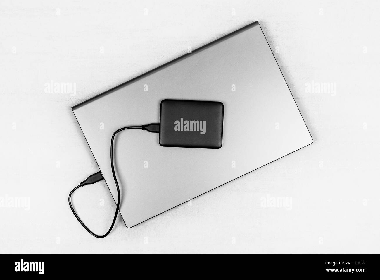 Hard disk on grey Black and White Stock Photos & Images - Alamy