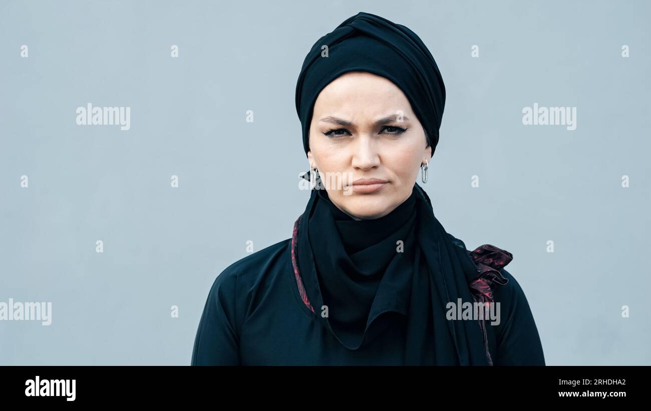 face of serious oppressed feminist woman in Muslim country Stock Photo ...