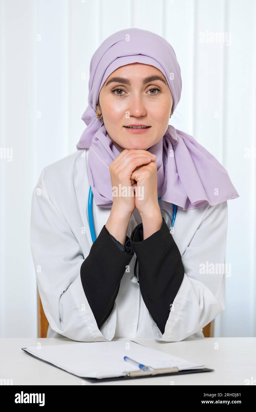 Cheerful muslim female doctor hi-res stock photography and images - Alamy