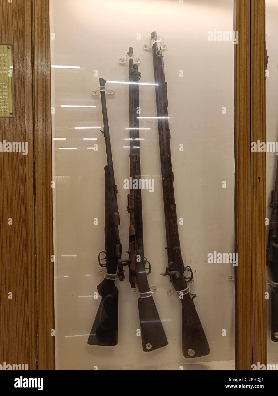A few rifles that show a variety of guns such as flintlock; musket ...