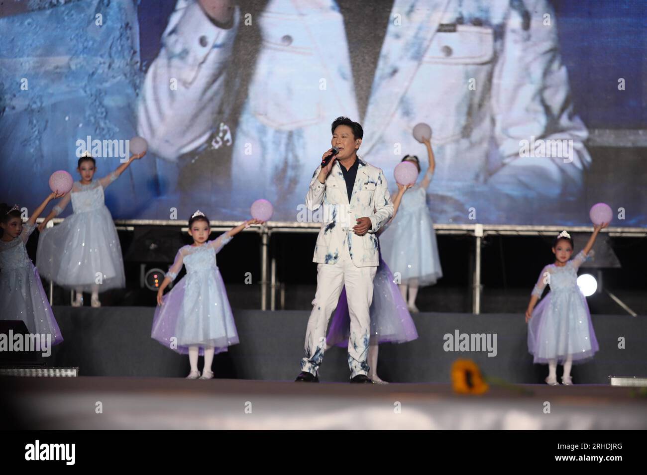Taiwanese singer and actor Jeff Chang sings at a concert in Pingliang ...