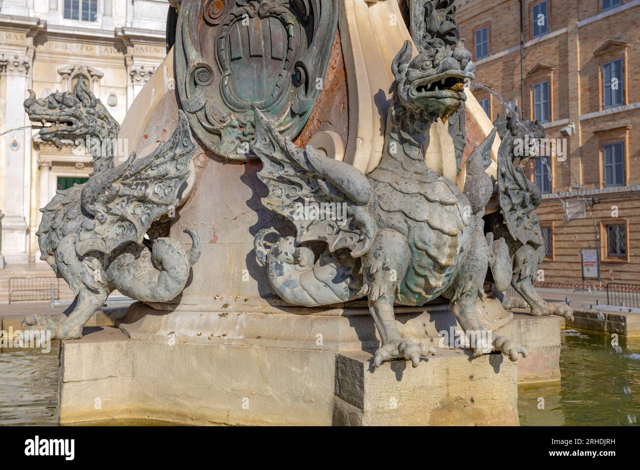 LORETO, ITALY, JULY 5, 2022 - Bronze statues depicting winged dragons ...