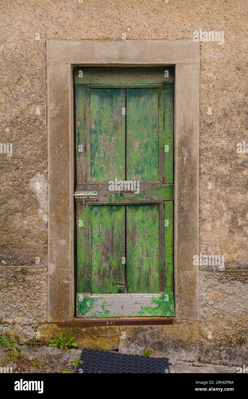 A door in an historic stone house in the mountain village of Mieli near ...