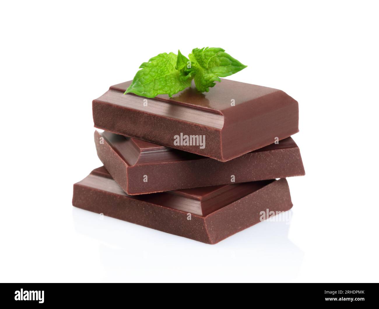 Chocolate bars with green mint leaves, isolated on white background ...