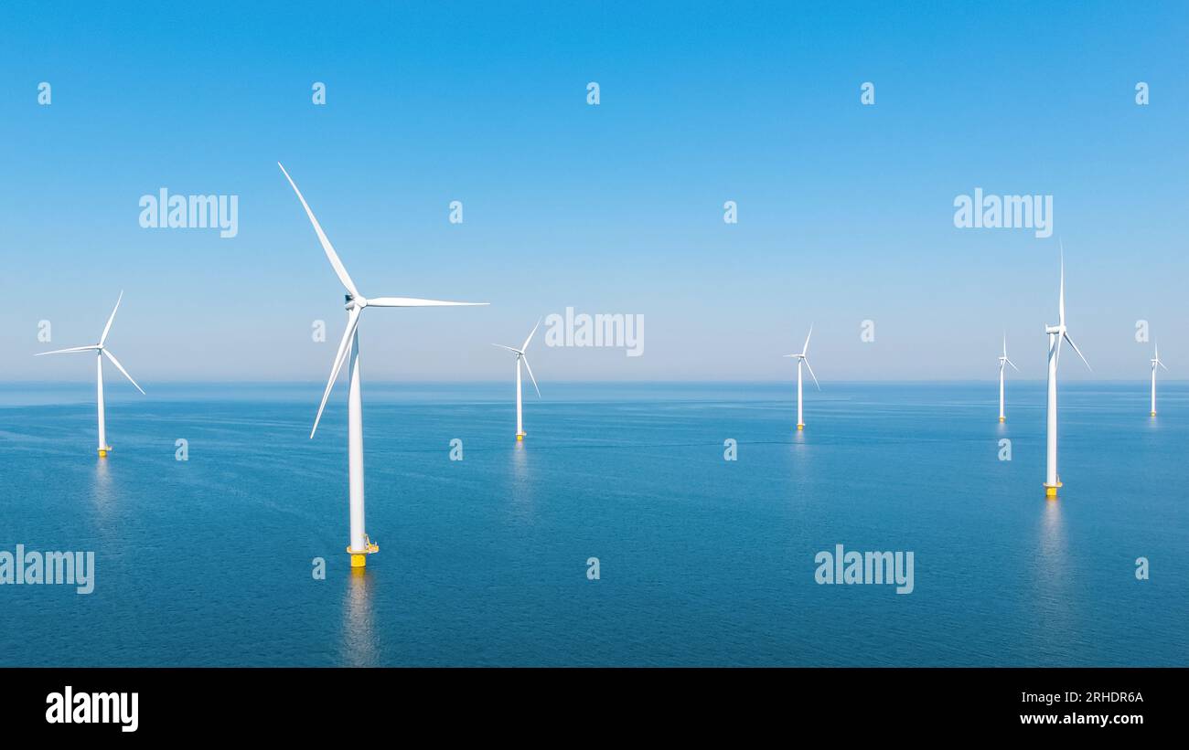 Ocean Wind Farm. Windmill farm in the ocean. Offshore wind turbines in ...