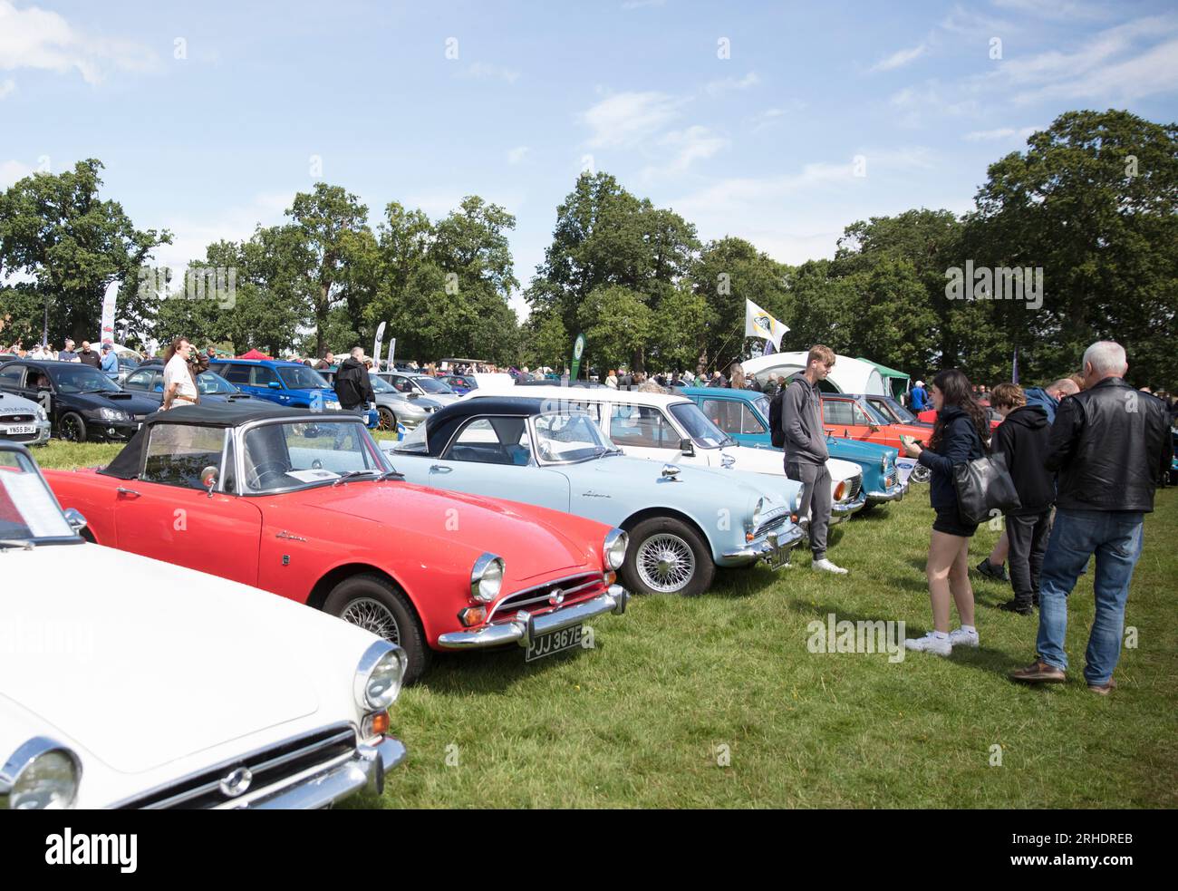 Classic car show, overlooking car bonnets, while Showgoer's view cars ...