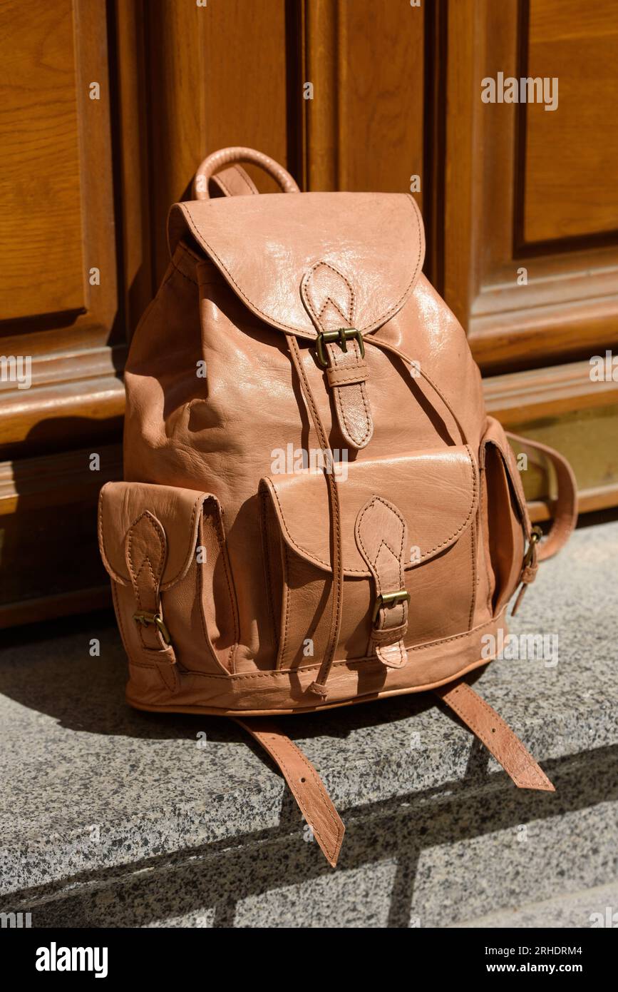 beige leather oldfashioned backpack. outdoors photo Stock Photo - Alamy