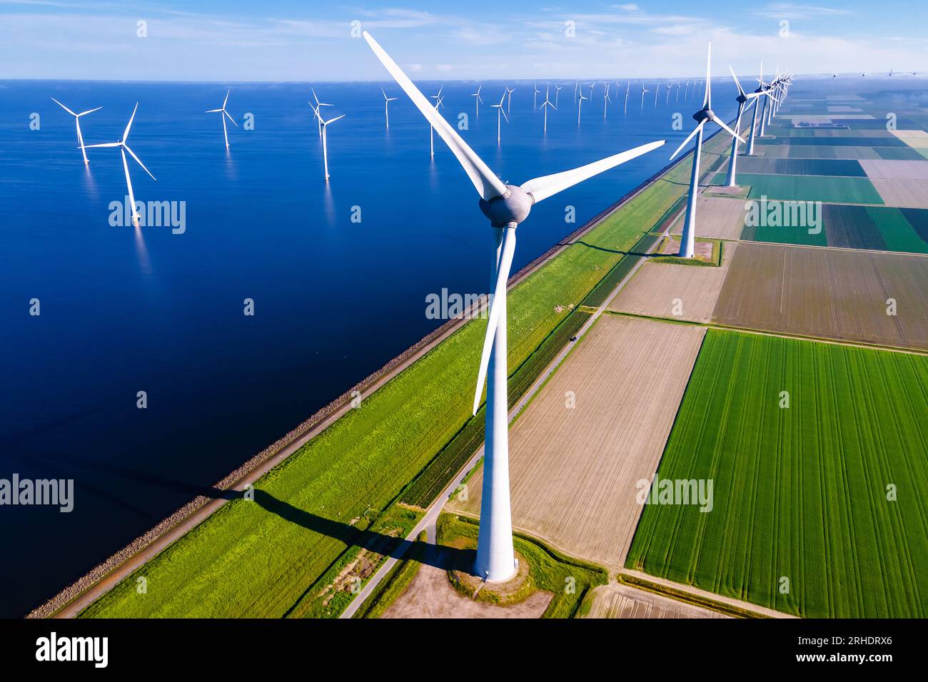 Windmill park in the ocean aerial view with wind turbine Flevoland ...