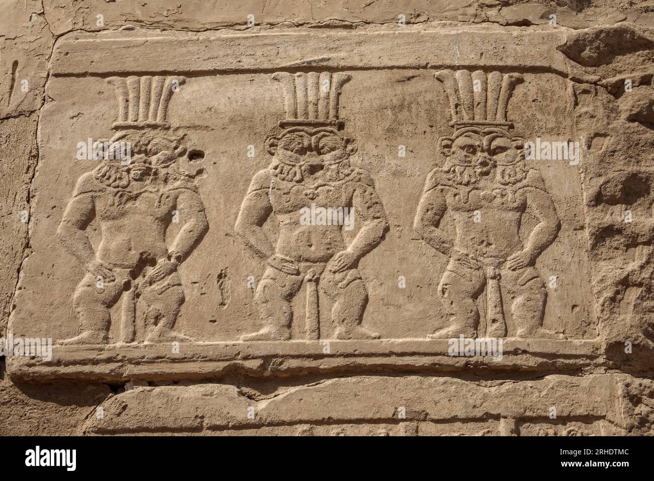 Carving of god Bes In the outer courtyard at Denderah Temple, near Qena ...