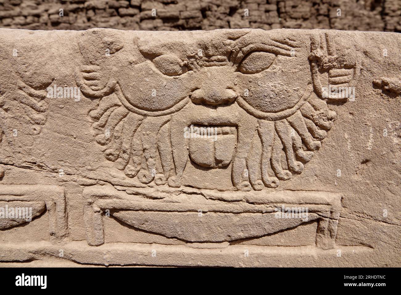 Carving of god Bes In the outer courtyard at Denderah Temple, near Qena ...